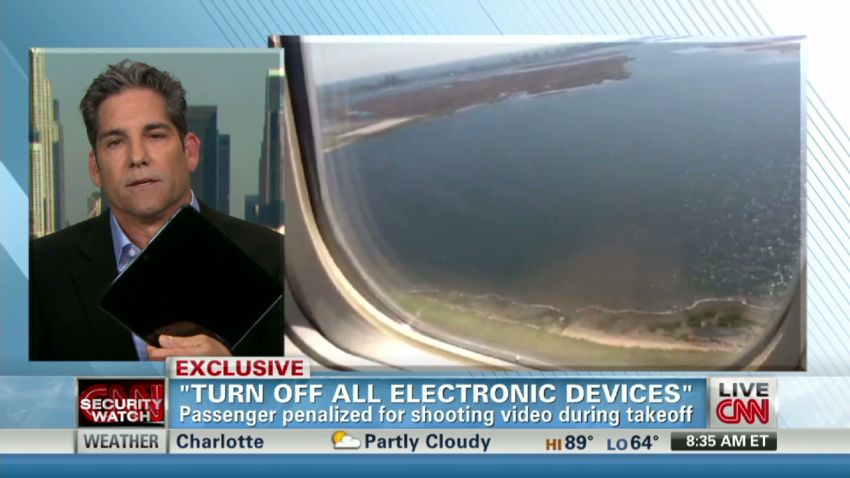 Passenger Punished For Using IPad On Airplane Calls FAA Rule passenger-punished-for-using-ipad-on-airplane-calls-faa-rule