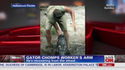 Gator clamps down on worker’s arm | CNN