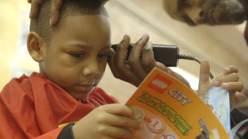 Barbershop Books places books in boys’ hands | CNN