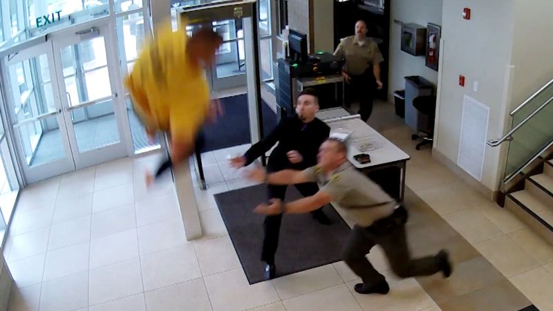 Man nosedives off courthouse balcony | CNN