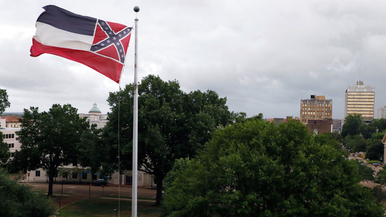 Mississippi Governor Signs Bill To Retire Flag With Confederate Emblem