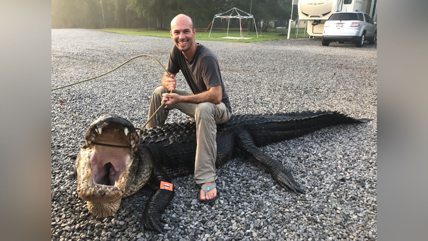 Two Mississippi boaters reel in a massive one-eyed alligator weighing ...