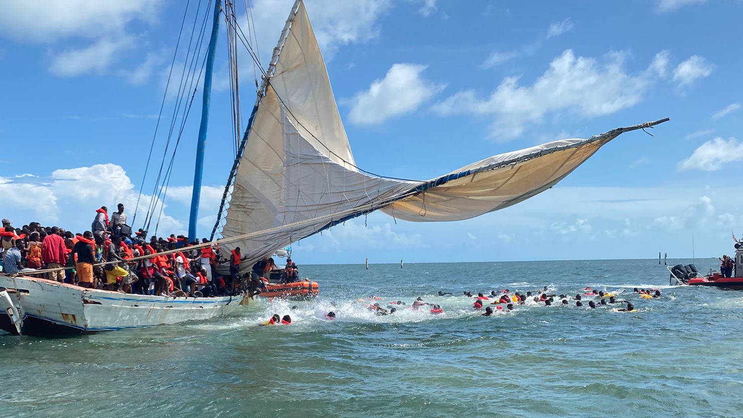 Hundreds of Haitian and Cuban migrants in custody after landing on or ... Hundreds of Haitian and Cuban migrants in custody after landing on or ...