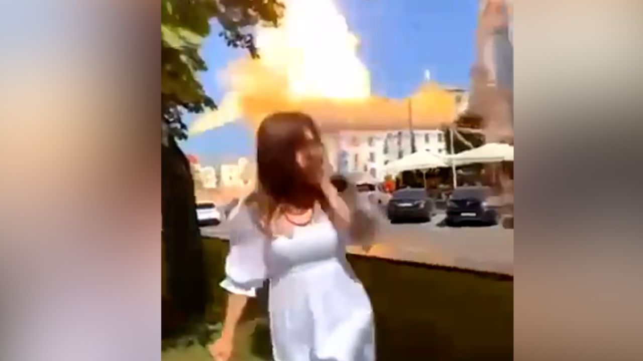 Missile strike hits as woman smiles for camera | CNN