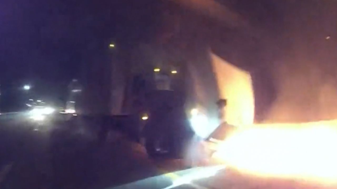 Watch: Police body cam shows dramatic moment before truck explodes | CNN