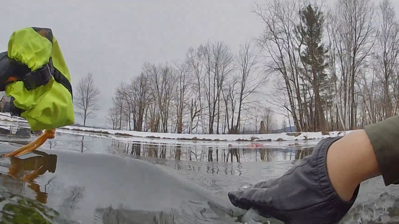 Girl gets trapped in icy pond. Bodycam captures what trooper did next | CNN