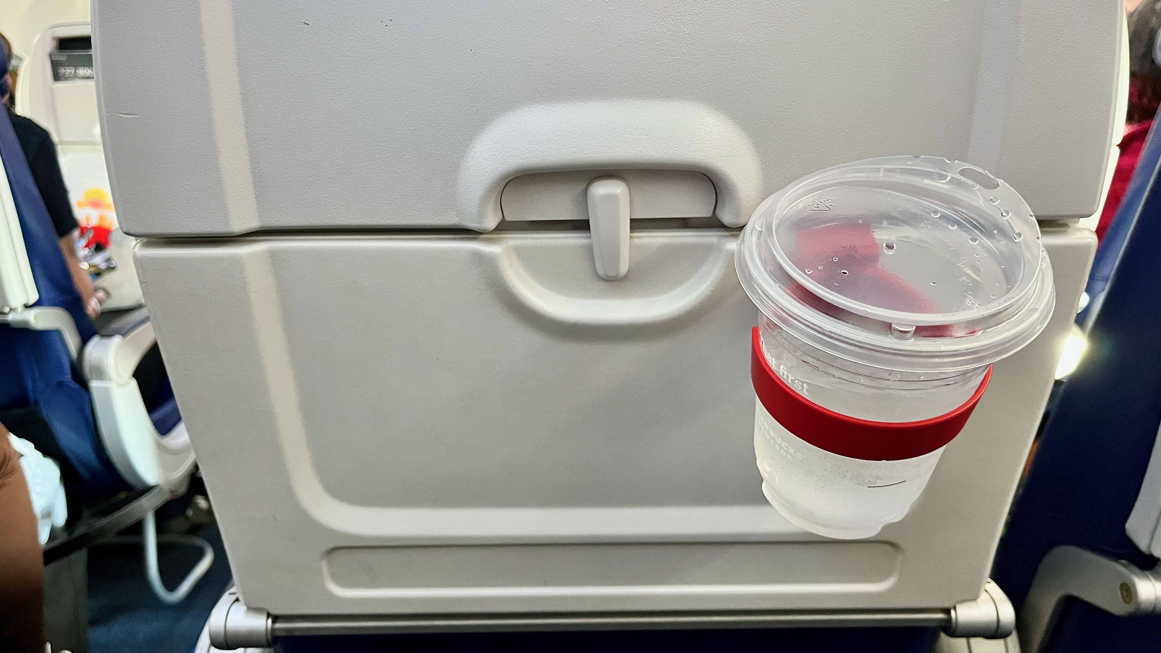 This $15 airplane cup holder is a must-have for frequent travelers ...